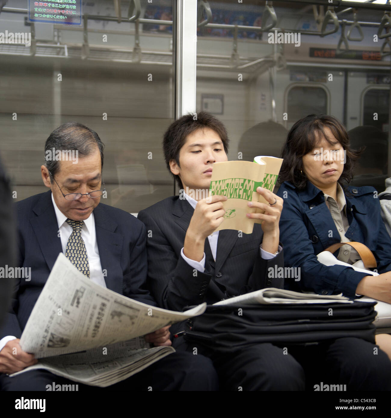 Passengers traveling in a subway train, Tokyo, Japan Stock Photo - Alamy
