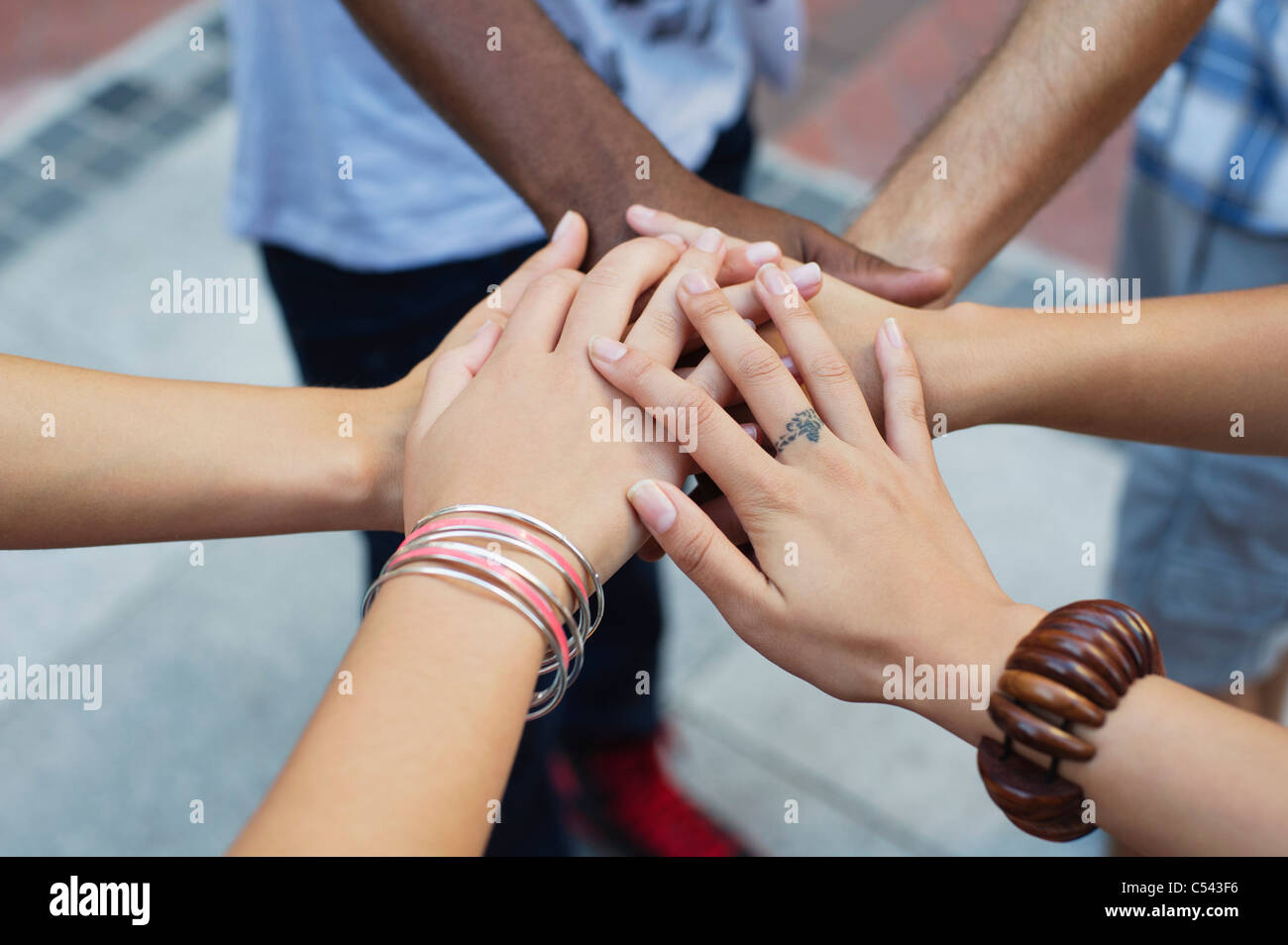 Stacking Hands High Resolution Stock Photography and Images - Alamy
