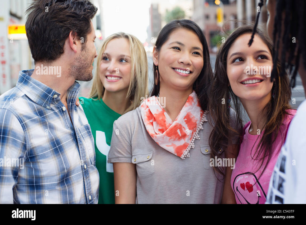 Smiling friends standing close hi-res stock photography and images - Alamy
