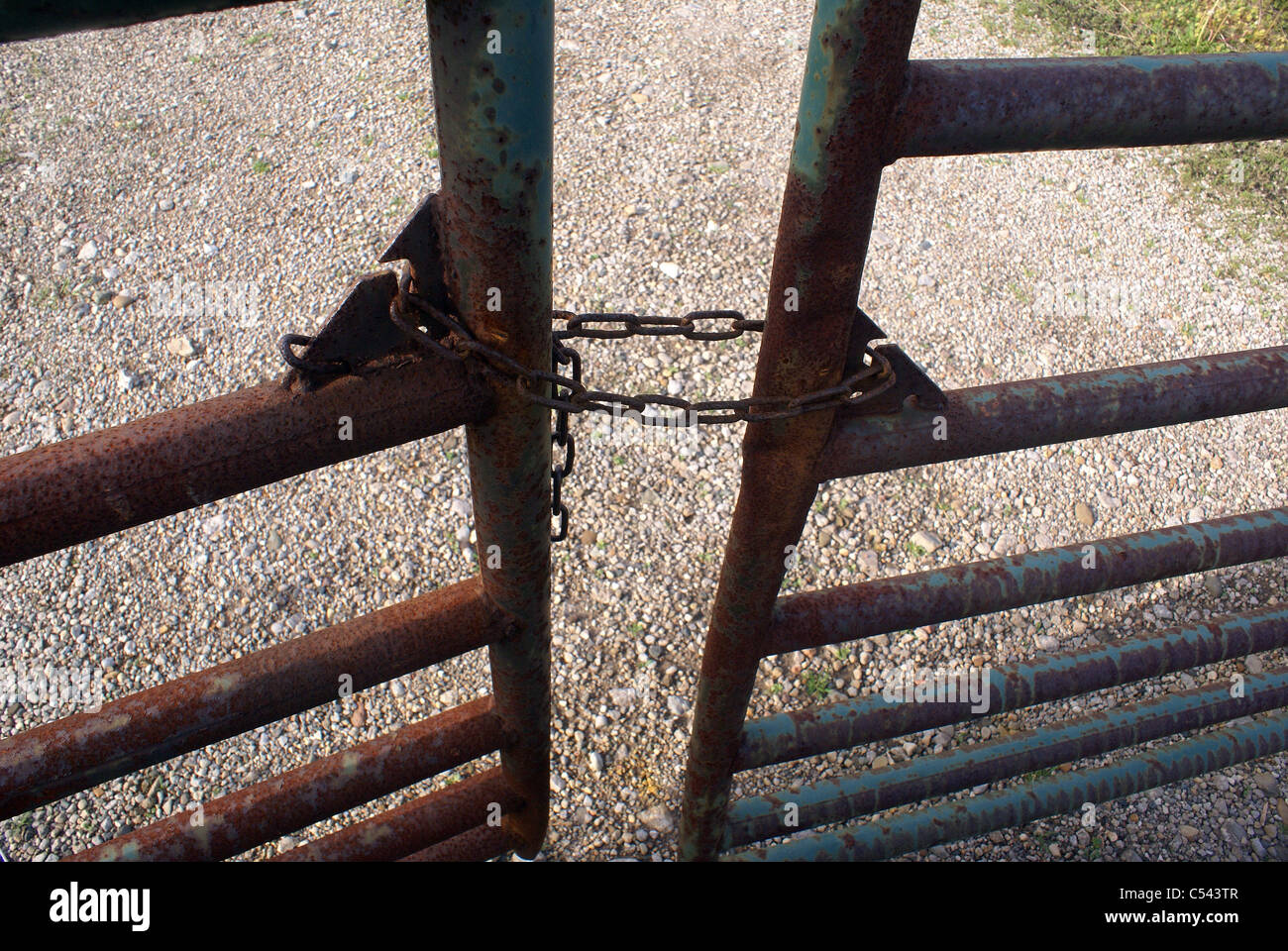 Gate chained closed Stock Photo - Alamy