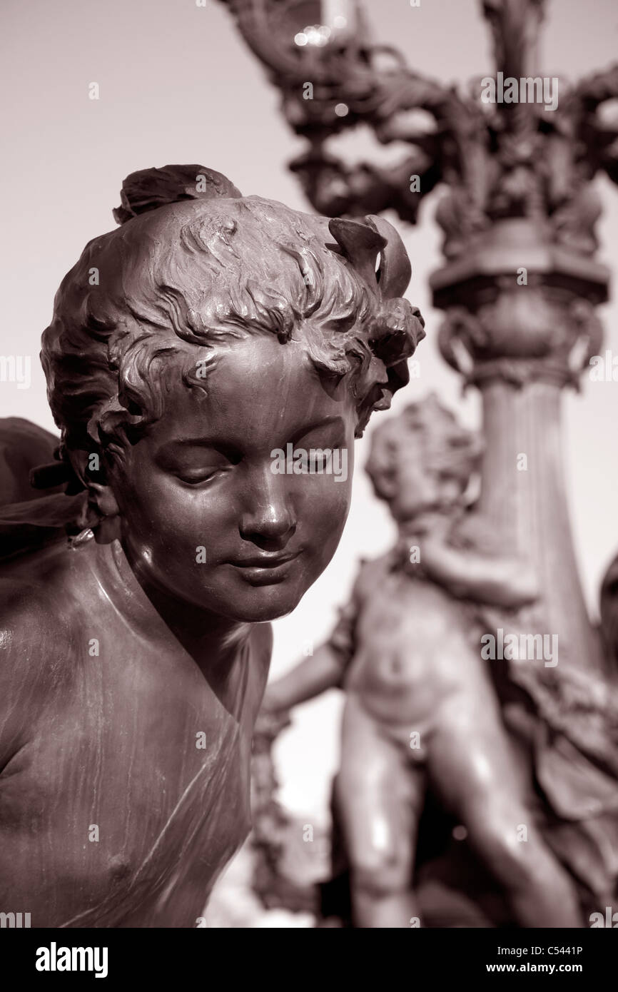 Figures on Alexandre III Bridge, Paris, France Stock Photo - Alamy