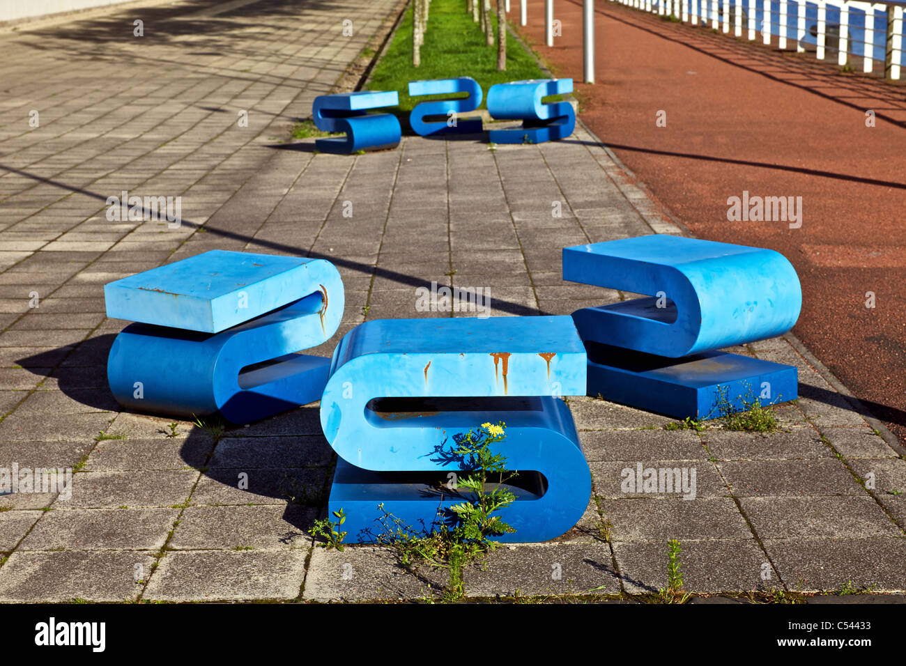 Groups of blue S shaped seats outside the STV studios beside the River ...