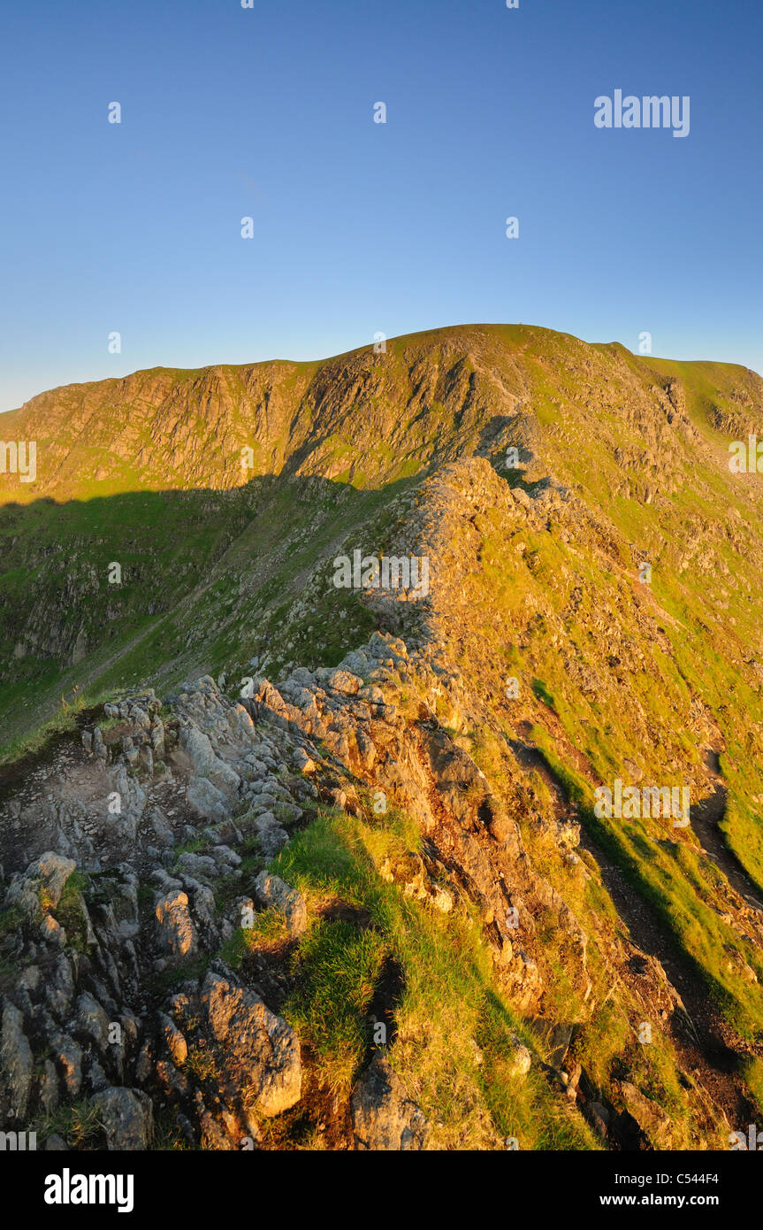 View of a deserted Striding Edge and Helvellyn at dawn in summer in the ...
