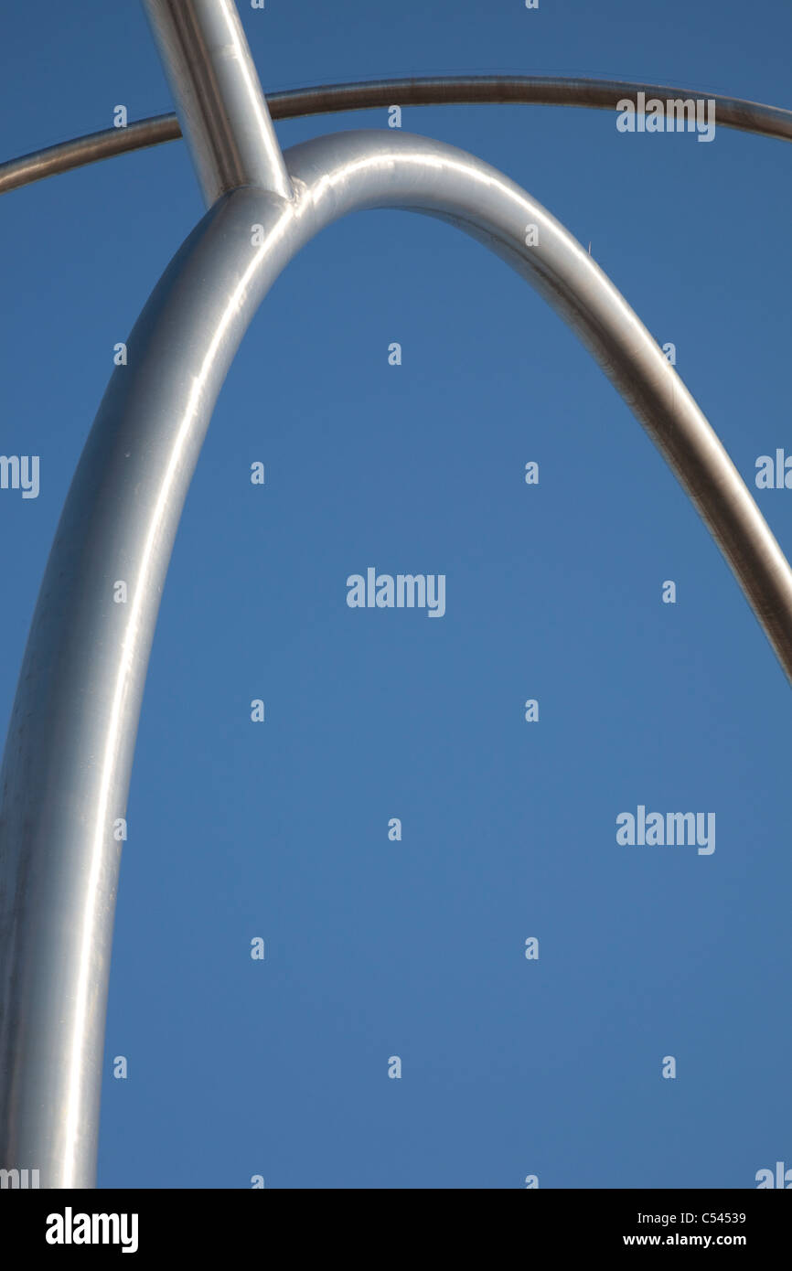 Metal Bar Curve against Blue Sky Background Stock Photo - Alamy