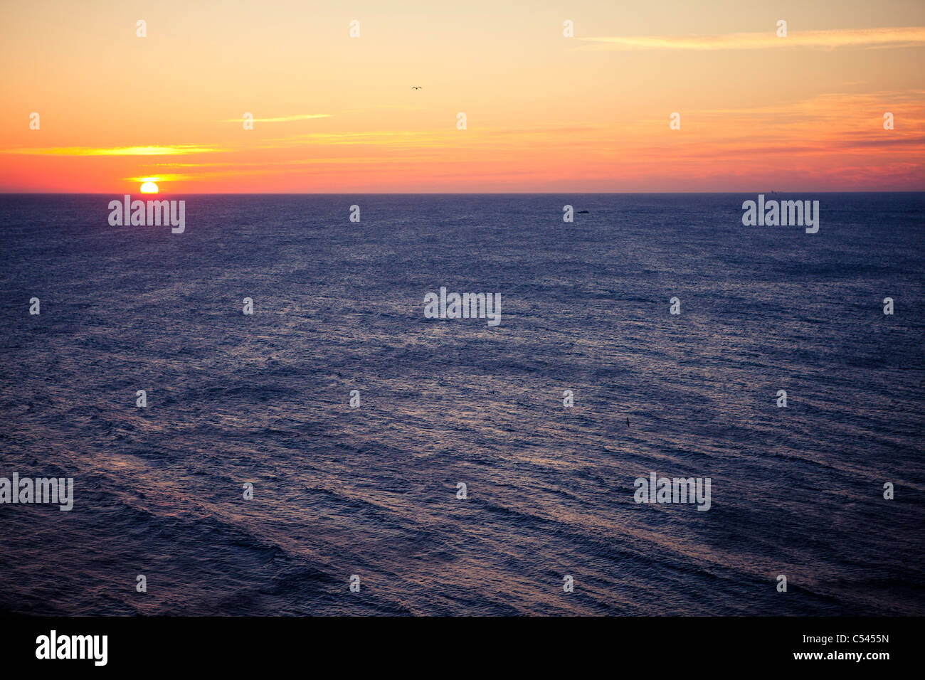 Water reflection of setting sun Stock Photo - Alamy