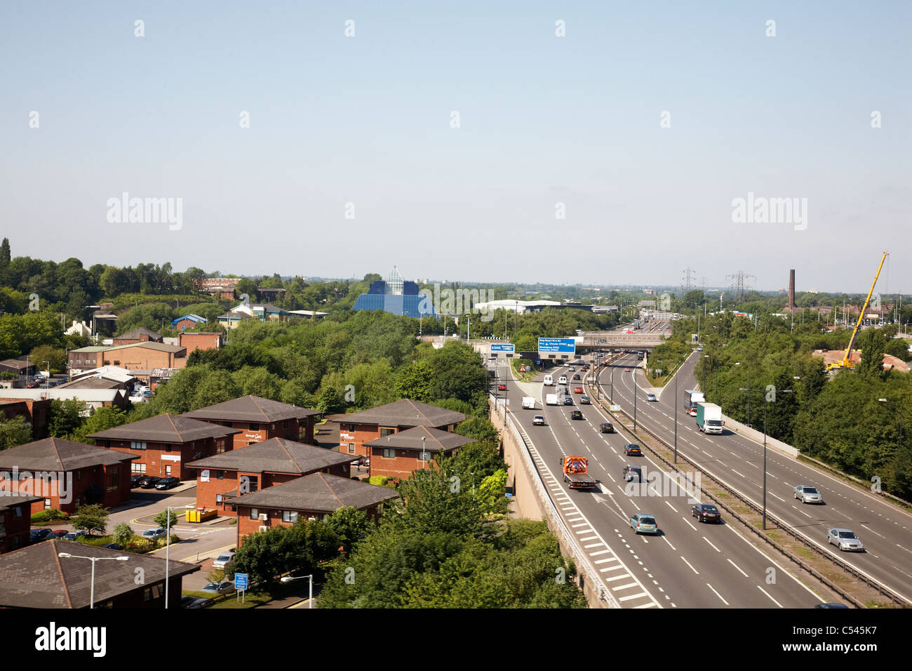 The M60 motorway with Pyramid building as seen from Stockport viaduct ...