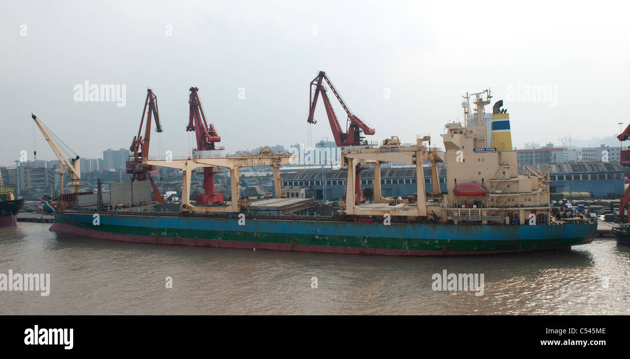 Container ship at a commercial dock, Yangtze River, Shanghai, China ...