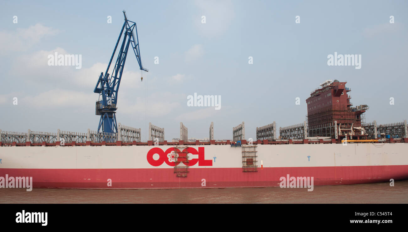 Container ship at a commercial dock, Yangtze River, Shanghai, China ...