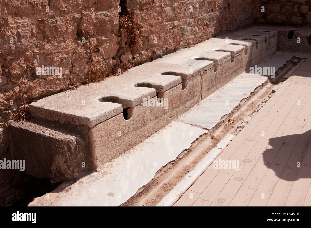 Ancient toilets, Ephesus, Turkey Stock Photo - Alamy