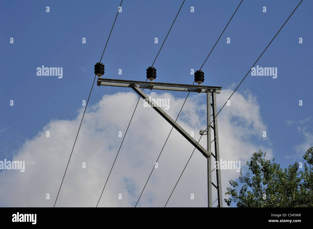 electric pillar with 4 lines Stock Photo - Alamy