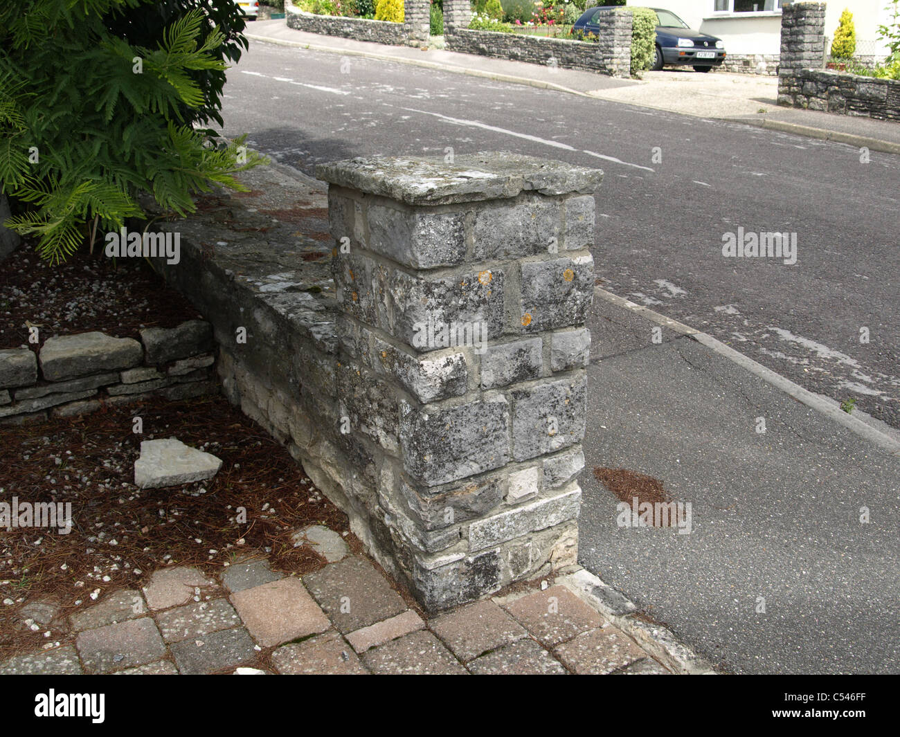 Purbeck dressed Stone pier in residential area end of paving drive next ...