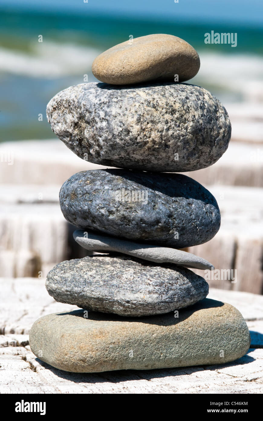 a tower of stones by the sea Stock Photo - Alamy
