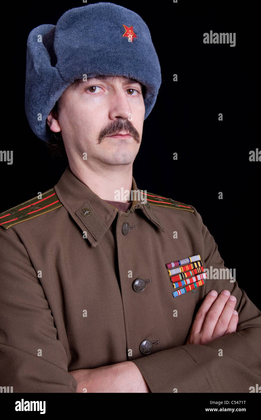 young man dressed as russian military, studio Stock Photo - Alamy