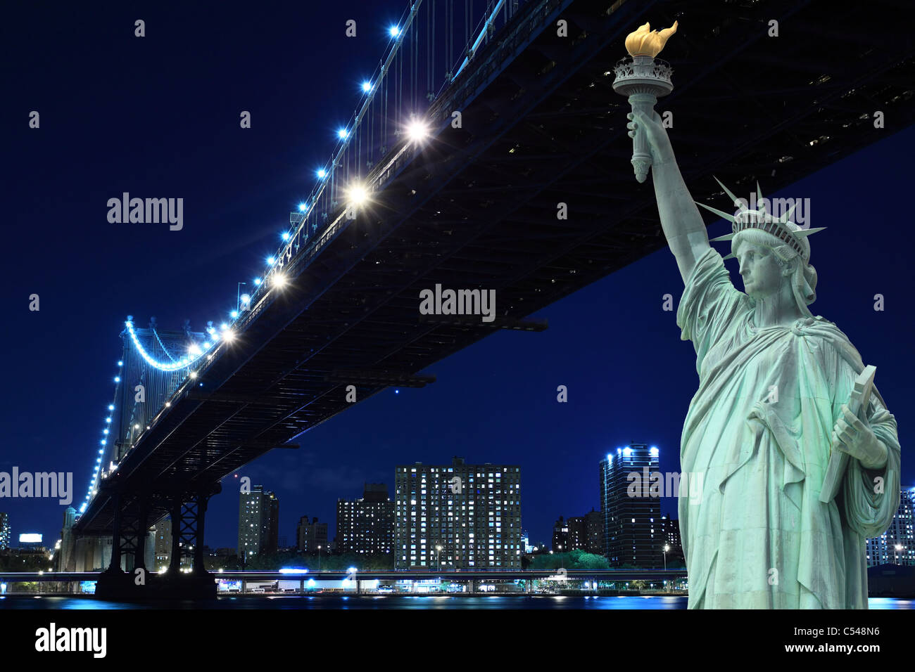 Manhattan Bridge and The Statue of Liberty at Night Lights, New York ...