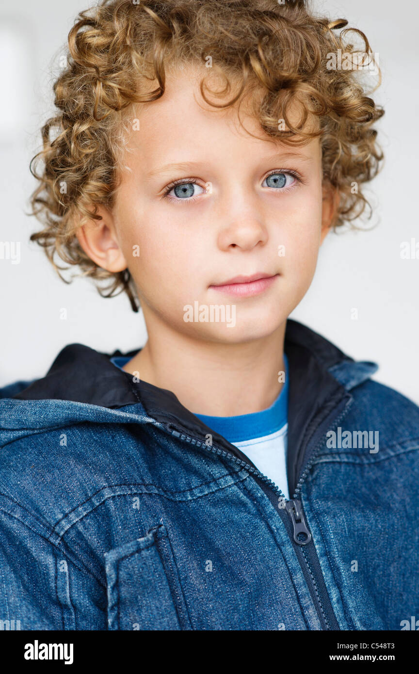 Cute boy curly blond hi-res stock photography and images - Alamy