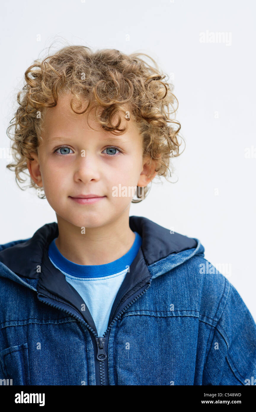 Cute boy curly blond hi-res stock photography and images - Alamy