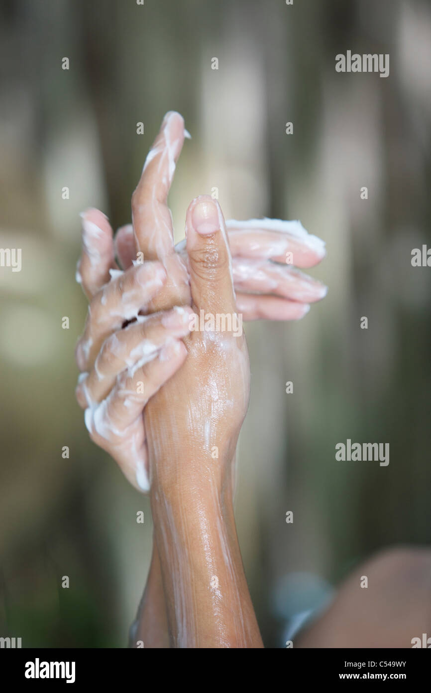 Close-up of a woman's hands with soap sud while bathing Stock Photo - Alamy