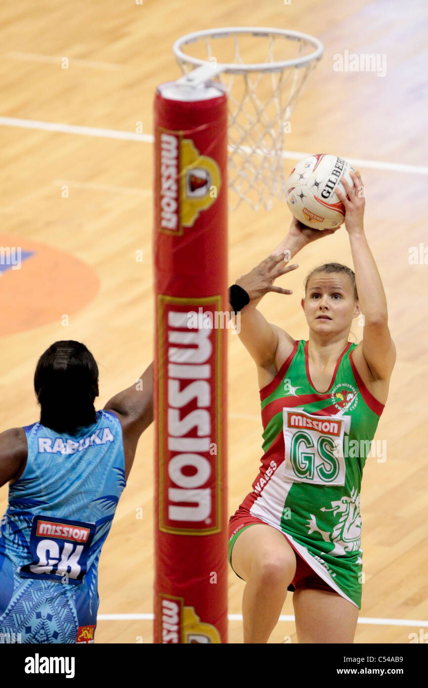 06.07.2011 Mere Rabuka of Fiji(left) goes in for the block on Rebecca ...