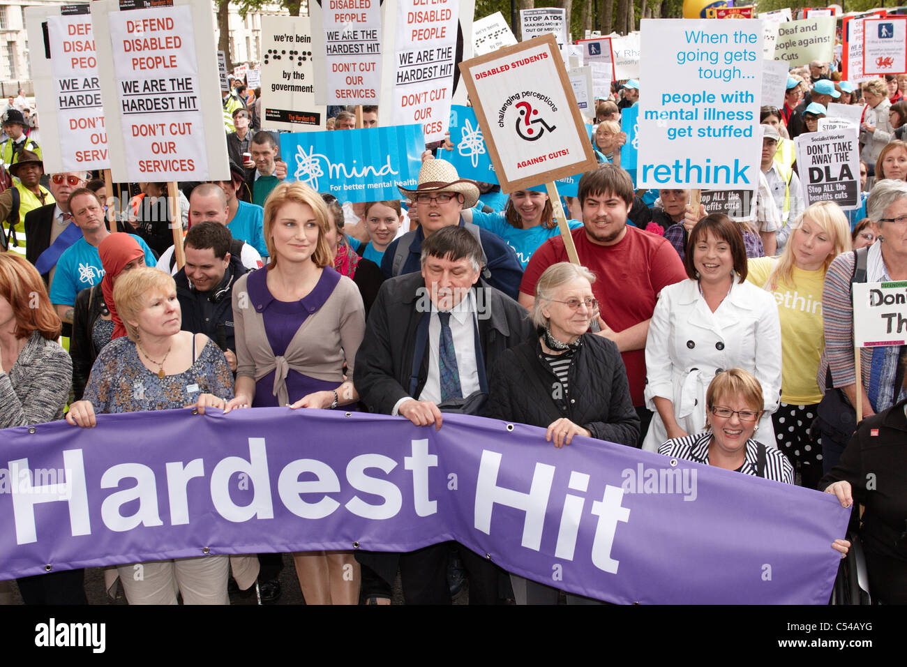Thousands of disabled people march past Parliament to protest against ...