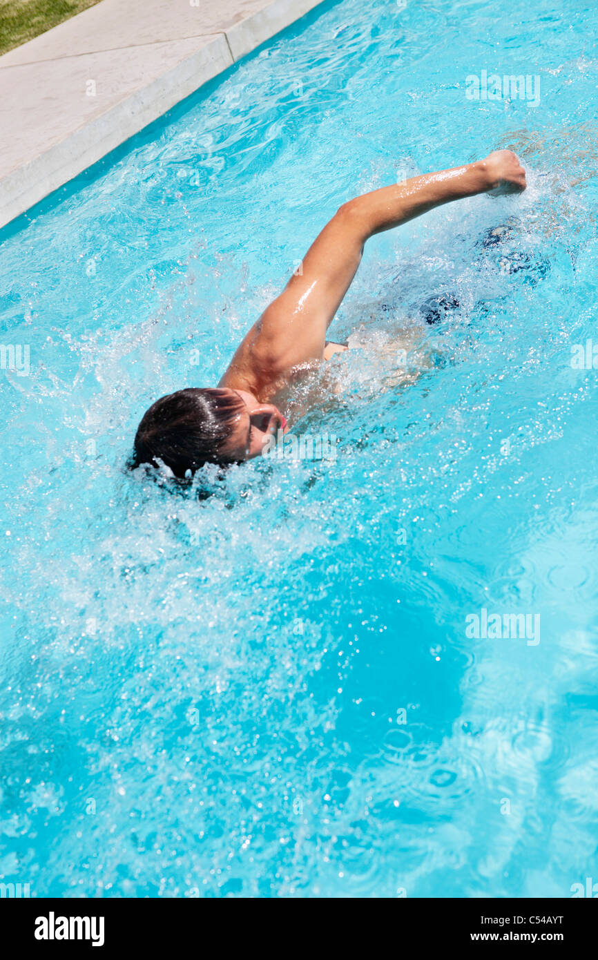 Man doing front crawl in swimming pool Stock Photo - Alamy