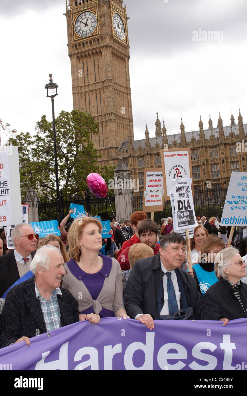 Thousands of disabled people march past Parliament to protest against ...