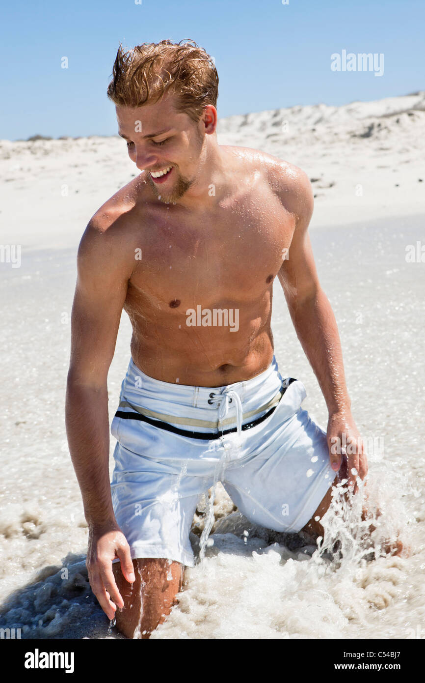 Man enjoying on a beach Stock Photo - Alamy