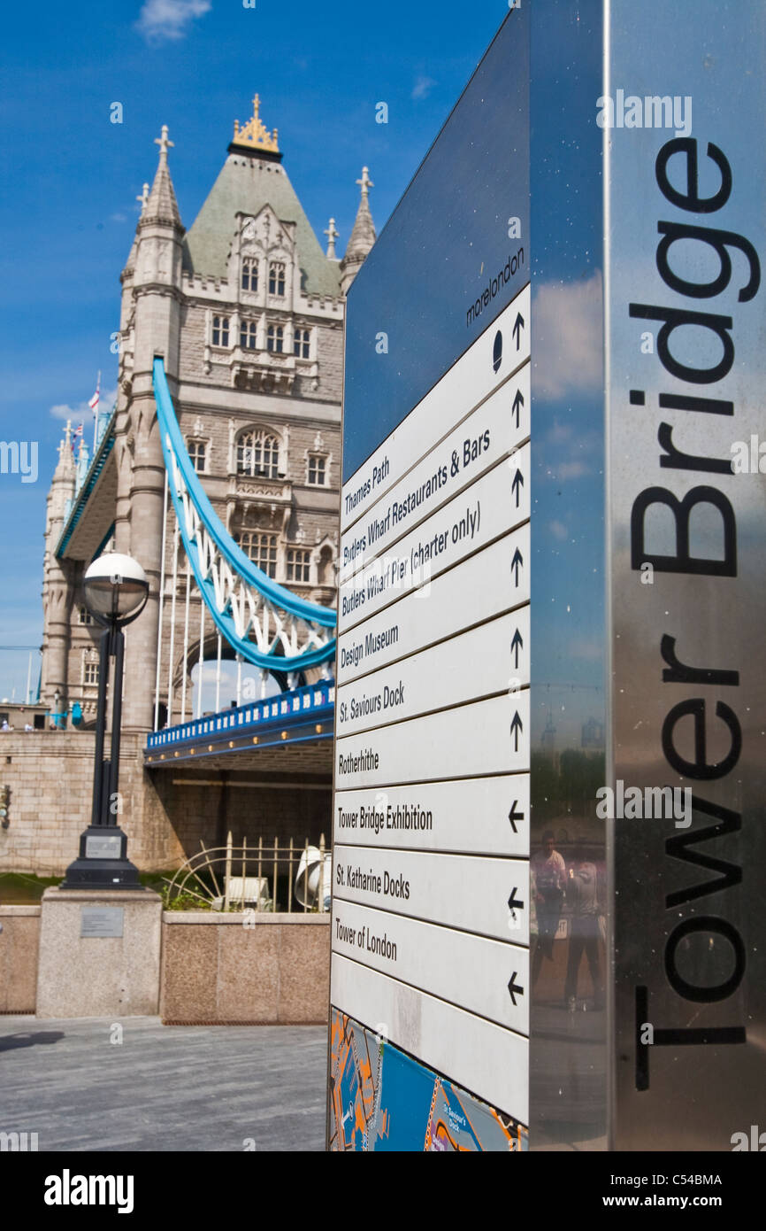 Tower bridge with sign Stock Photo - Alamy