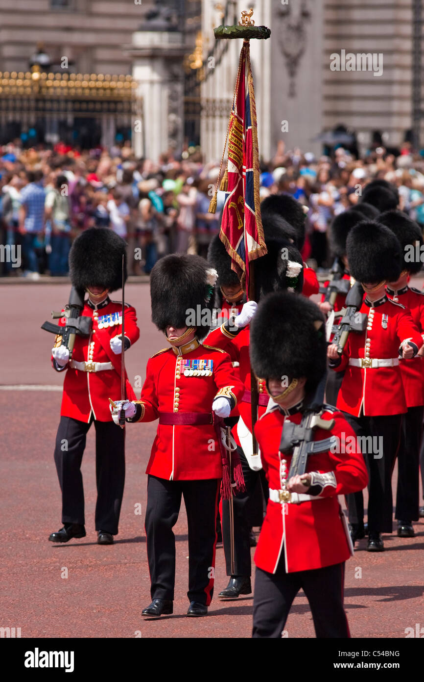 Welsh guards marching out of Buckingham palace with their Colours Stock ...