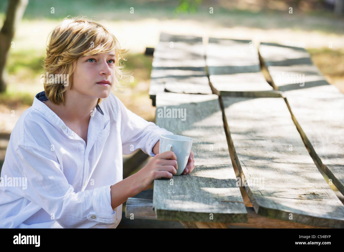 Little boy drinking tea hi-res stock photography and images - Alamy