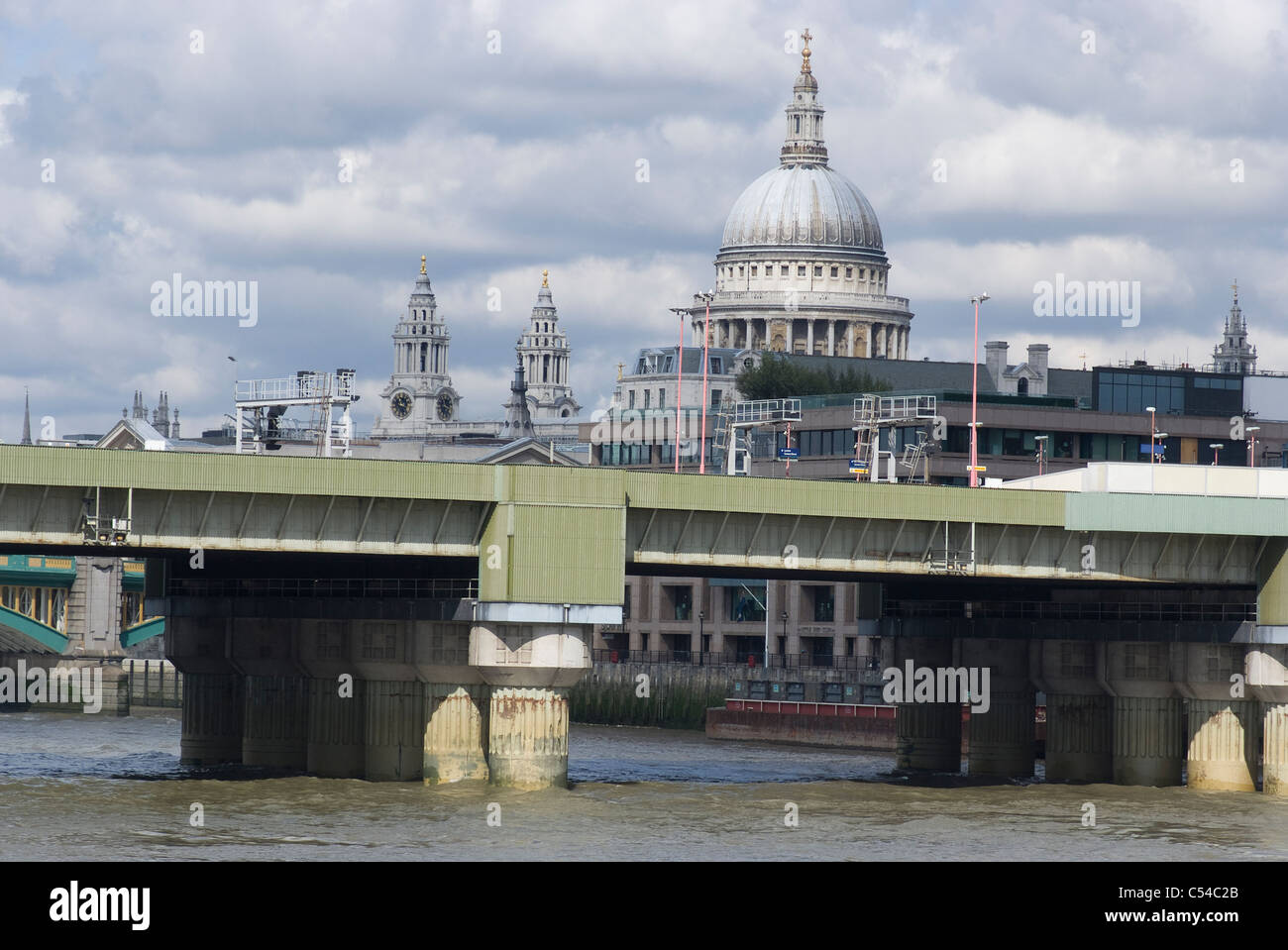 Cannon Street Bridge and station approach over the River Thames with St ...