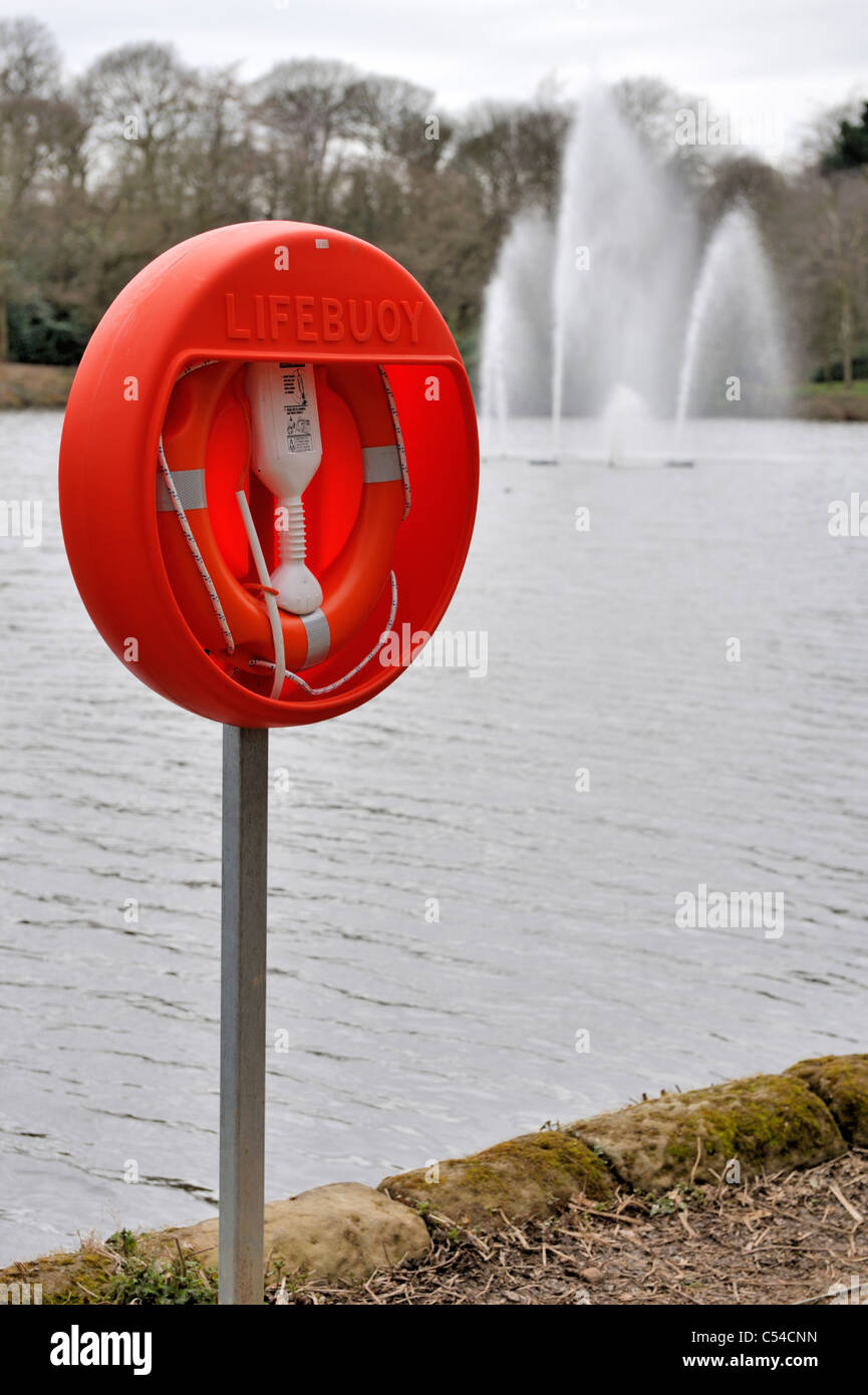 Lifebuoy by lake Stock Photo - Alamy
