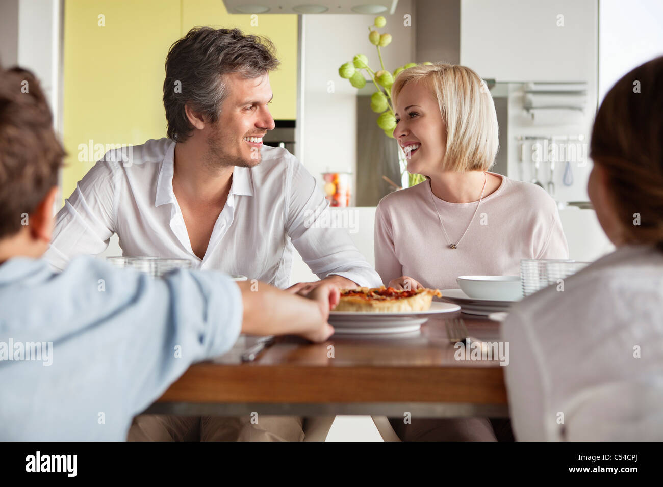 Family having food Stock Photo - Alamy