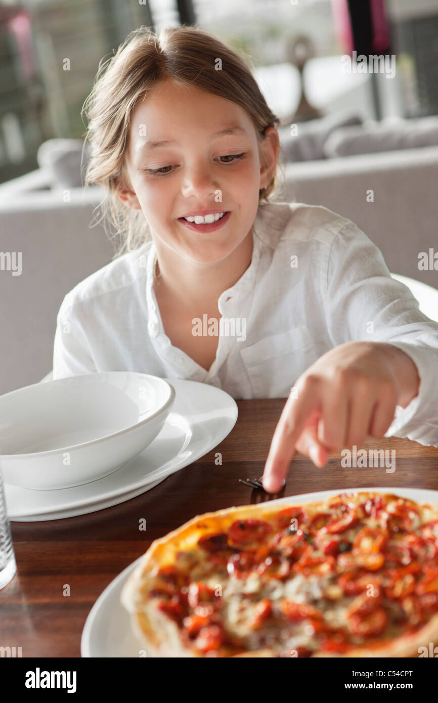 Girl pointing at food Stock Photo - Alamy