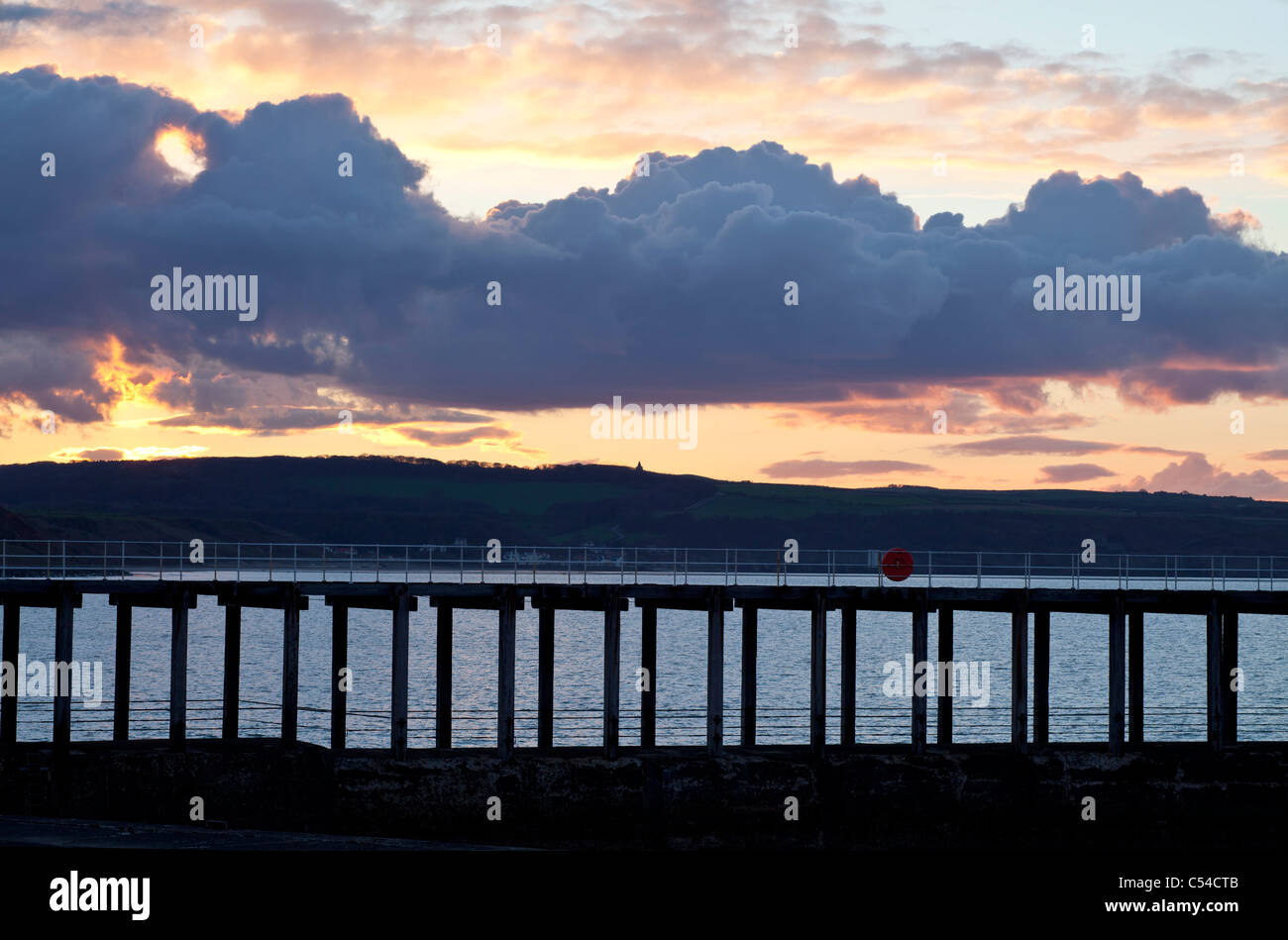 Whitby pier at sunset hi-res stock photography and images - Alamy