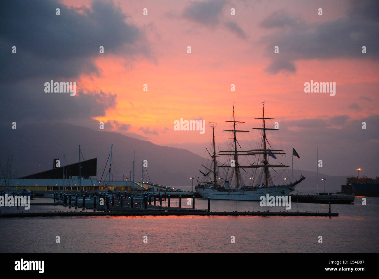 German training ship Gorch Fock in the Portas do Mar complex at sunrise ...