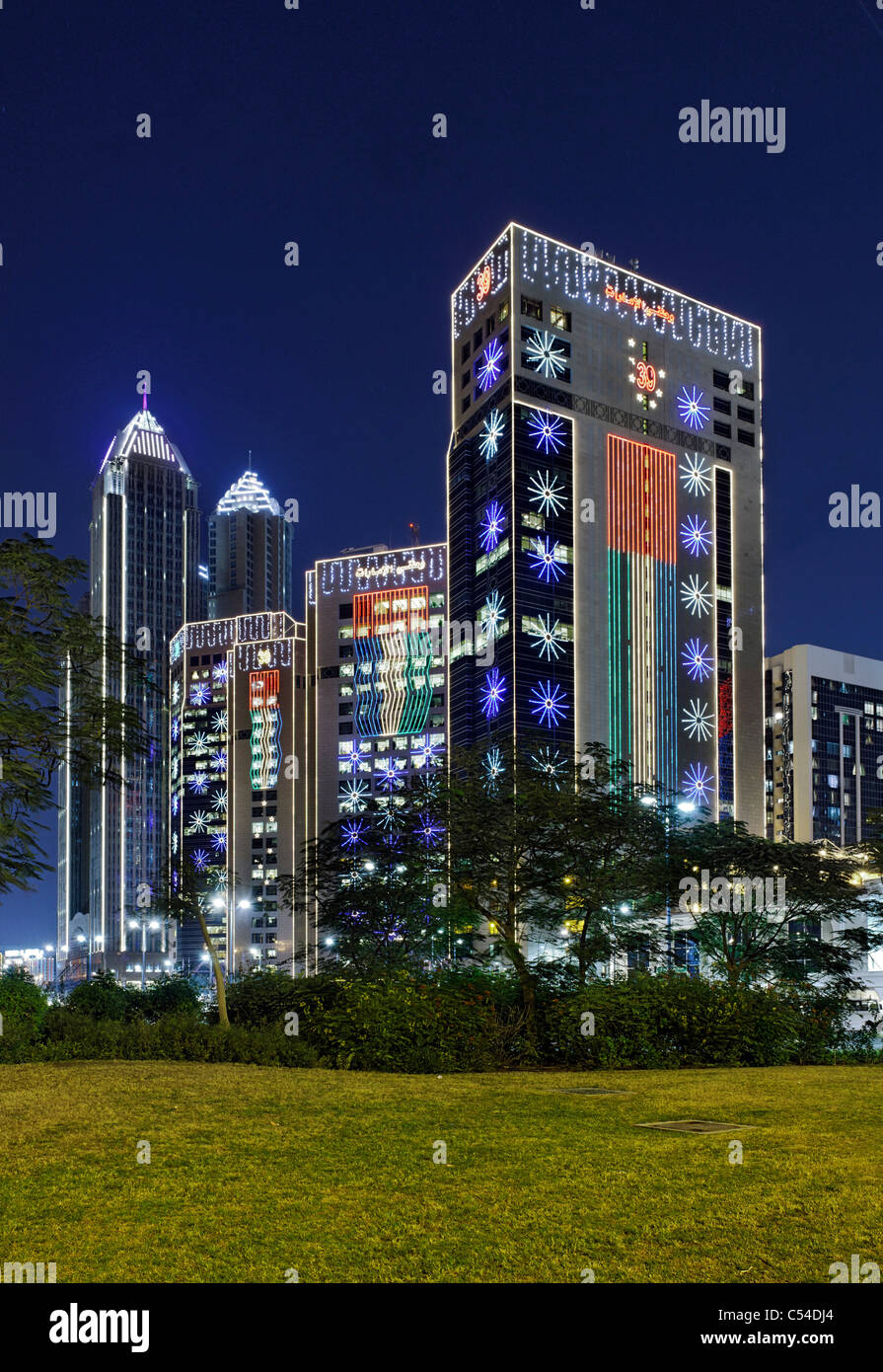 High-rise buildings on Corniche Road, illuminated with LED lights, Abu ...