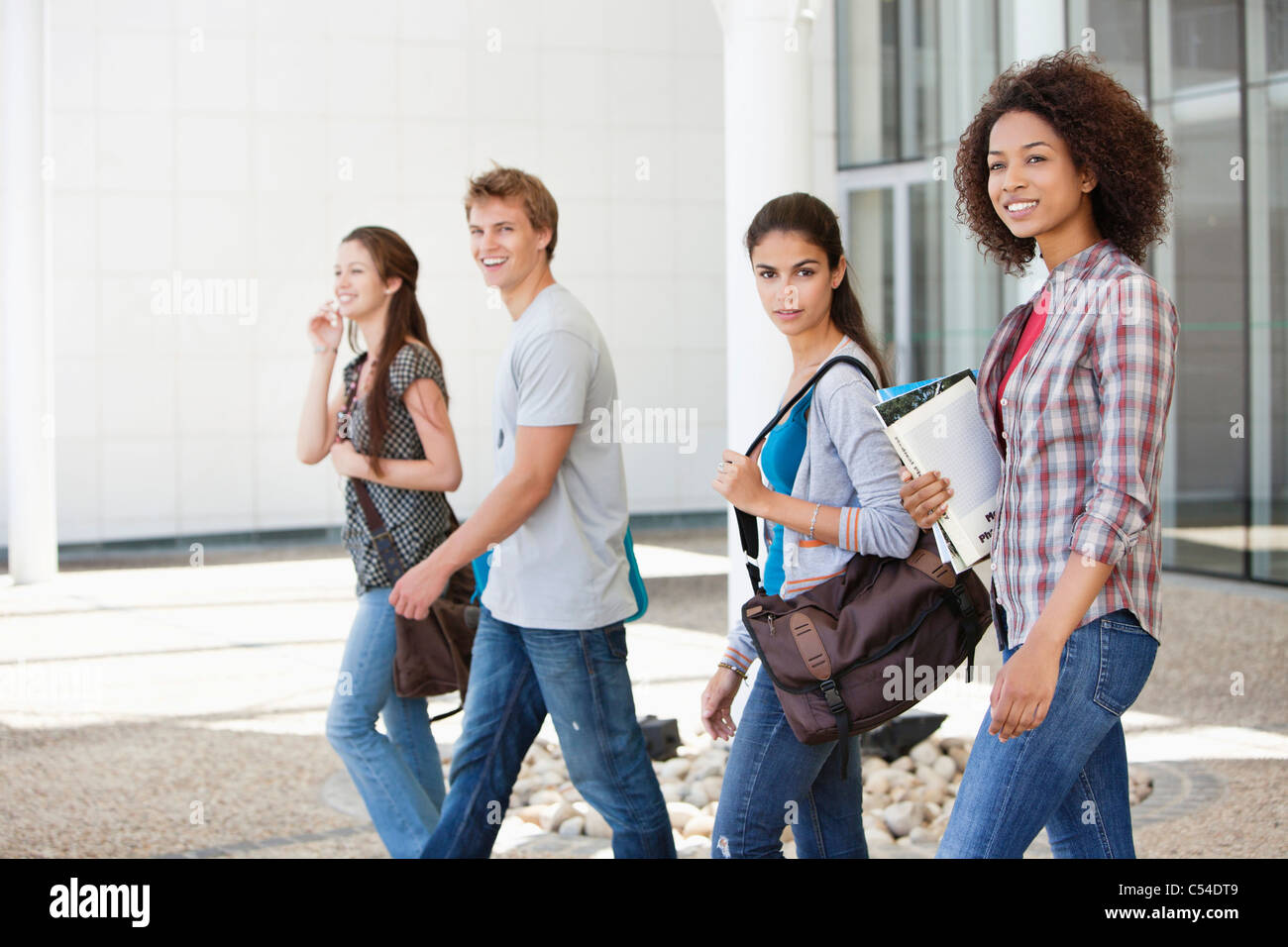 University students walking in a campus Stock Photo - Alamy University students walking in a campus Stock Photo - Alamy