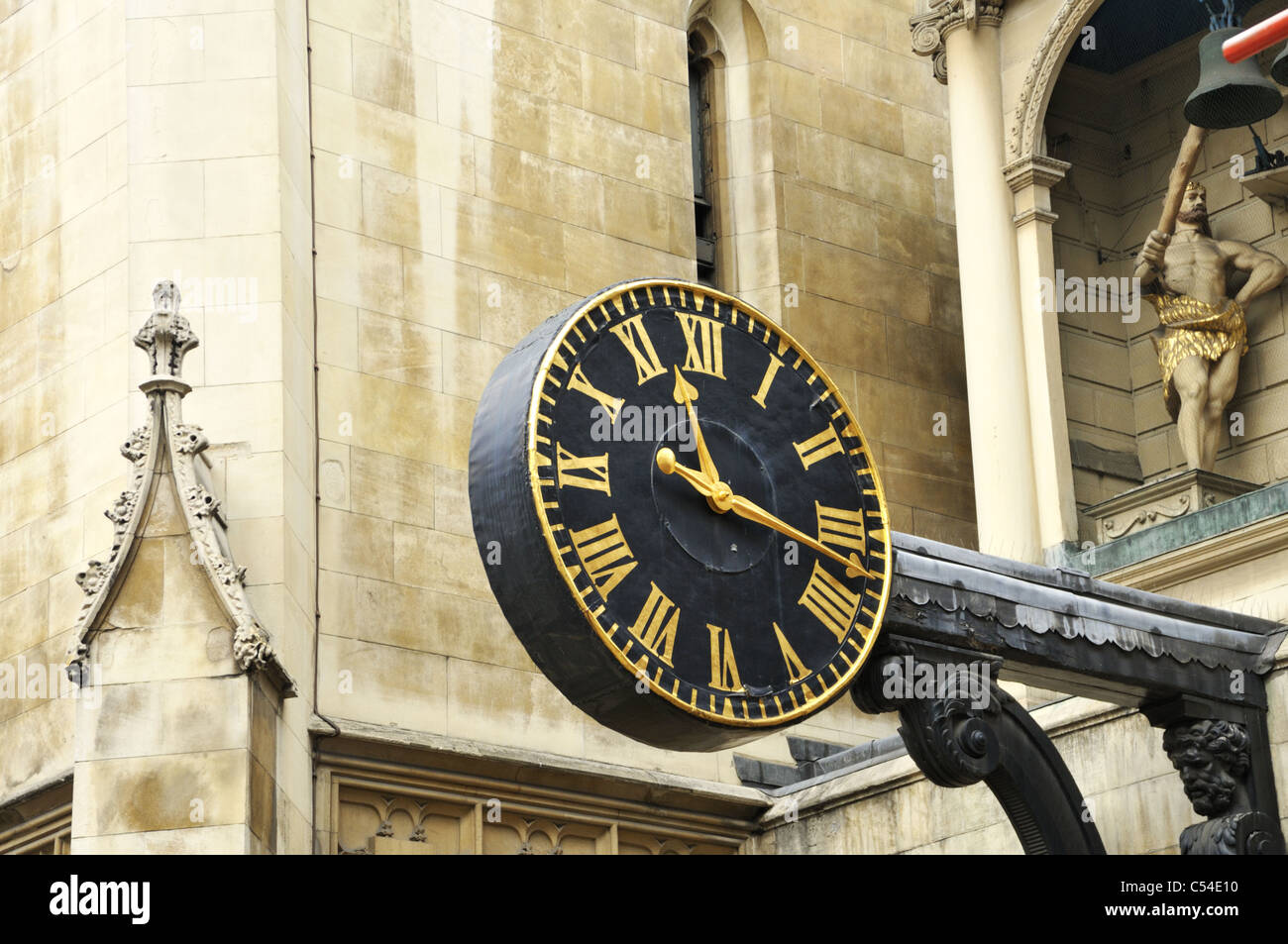 Clock on the Strand facade of the Royal Courts of Justice, London, UK ...