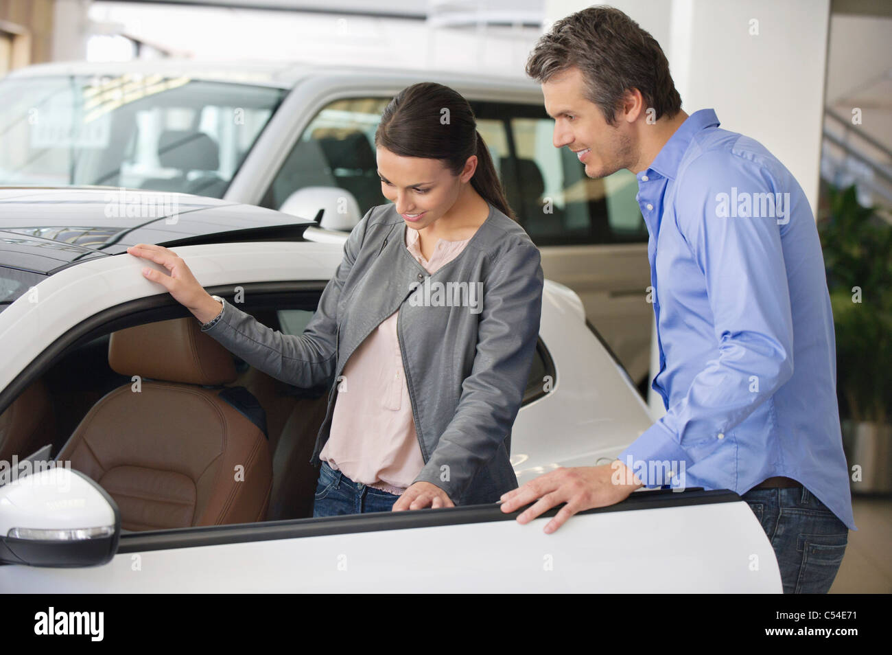 Two young men at door hi-res stock photography and images - Alamy