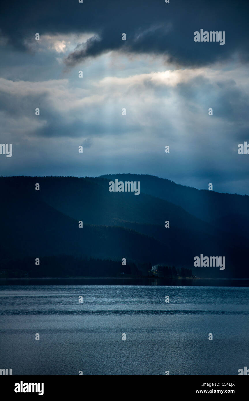Vertical sunset at dam. Blue colors Stock Photo - Alamy