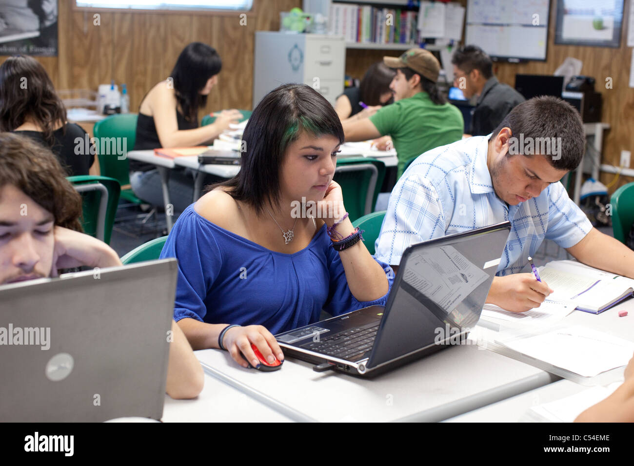 Students use laptop computers in classroom of El Paso, Texas high ...