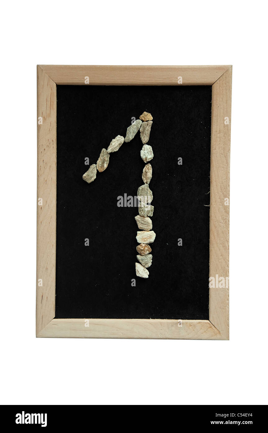 Number one stone made on black background in frame Stock Photo - Alamy