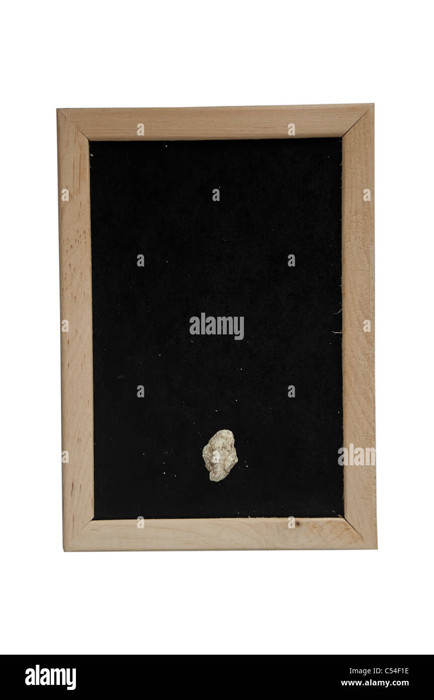 Point stone made on black background in frame Stock Photo - Alamy