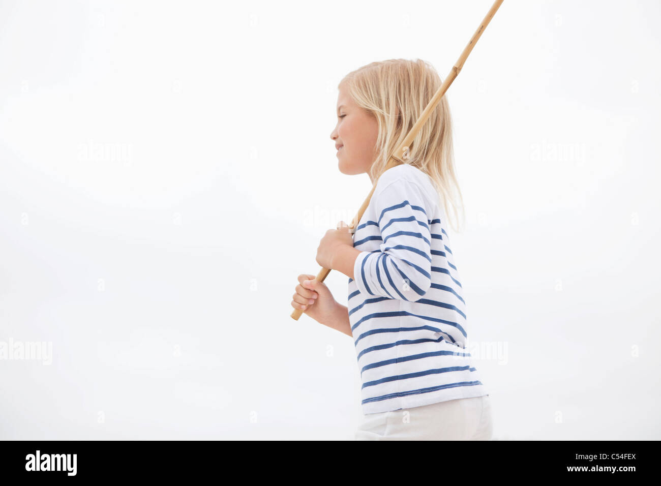Girl With Stick High Resolution Stock Photography and Images - Alamy