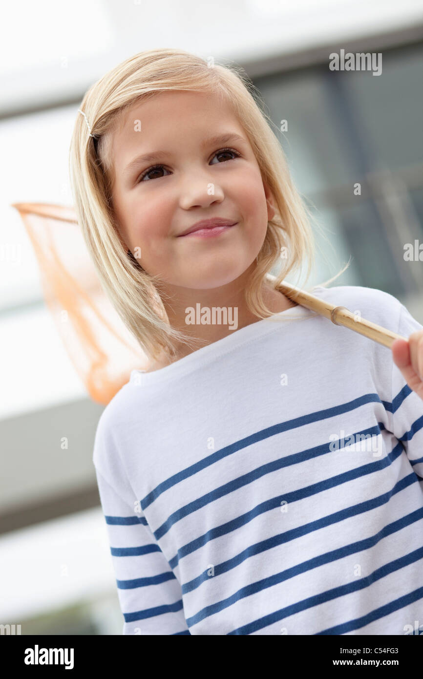 Cute girl looking away Stock Photo - Alamy