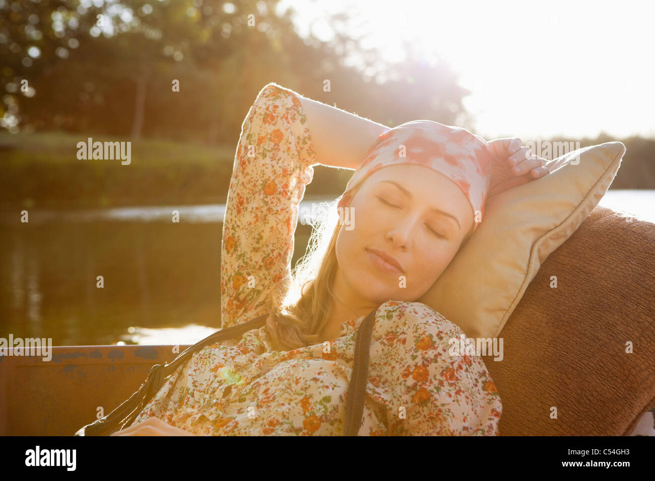 Beautiful woman sleeping in the boat Stock Photo - Alamy