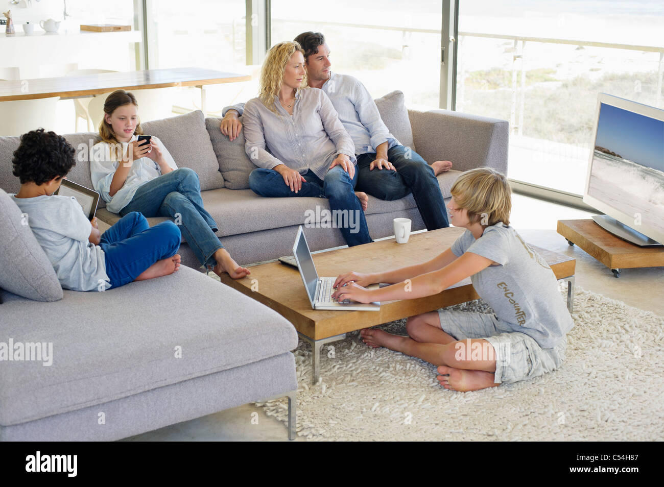 Sitting cross legged arts culture and entertainment watching childhood ...