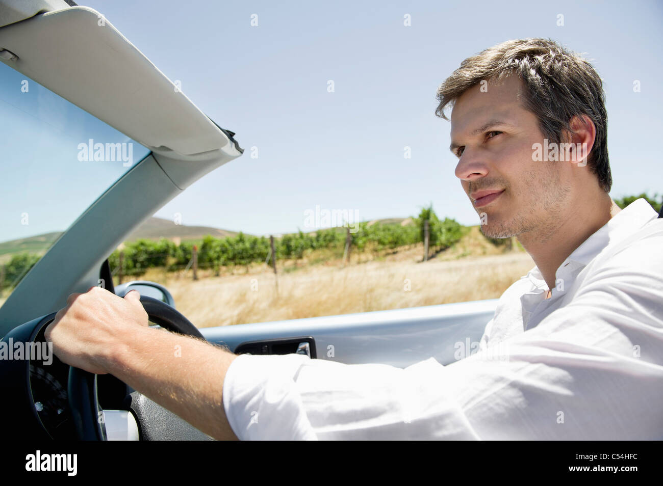 Man driving convertible hi-res stock photography and images - Alamy