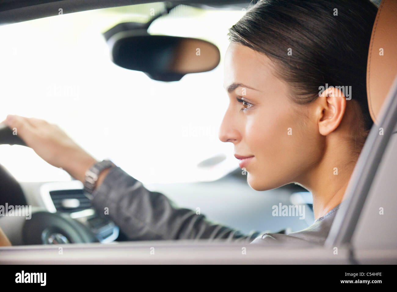 Young woman taking a test drive Stock Photo - Alamy