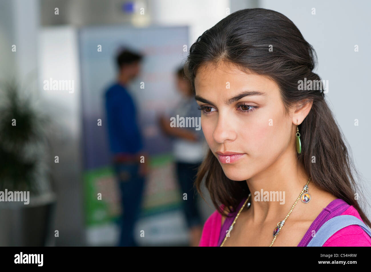 Close-up of a female university student looking serious Stock Photo - Alamy